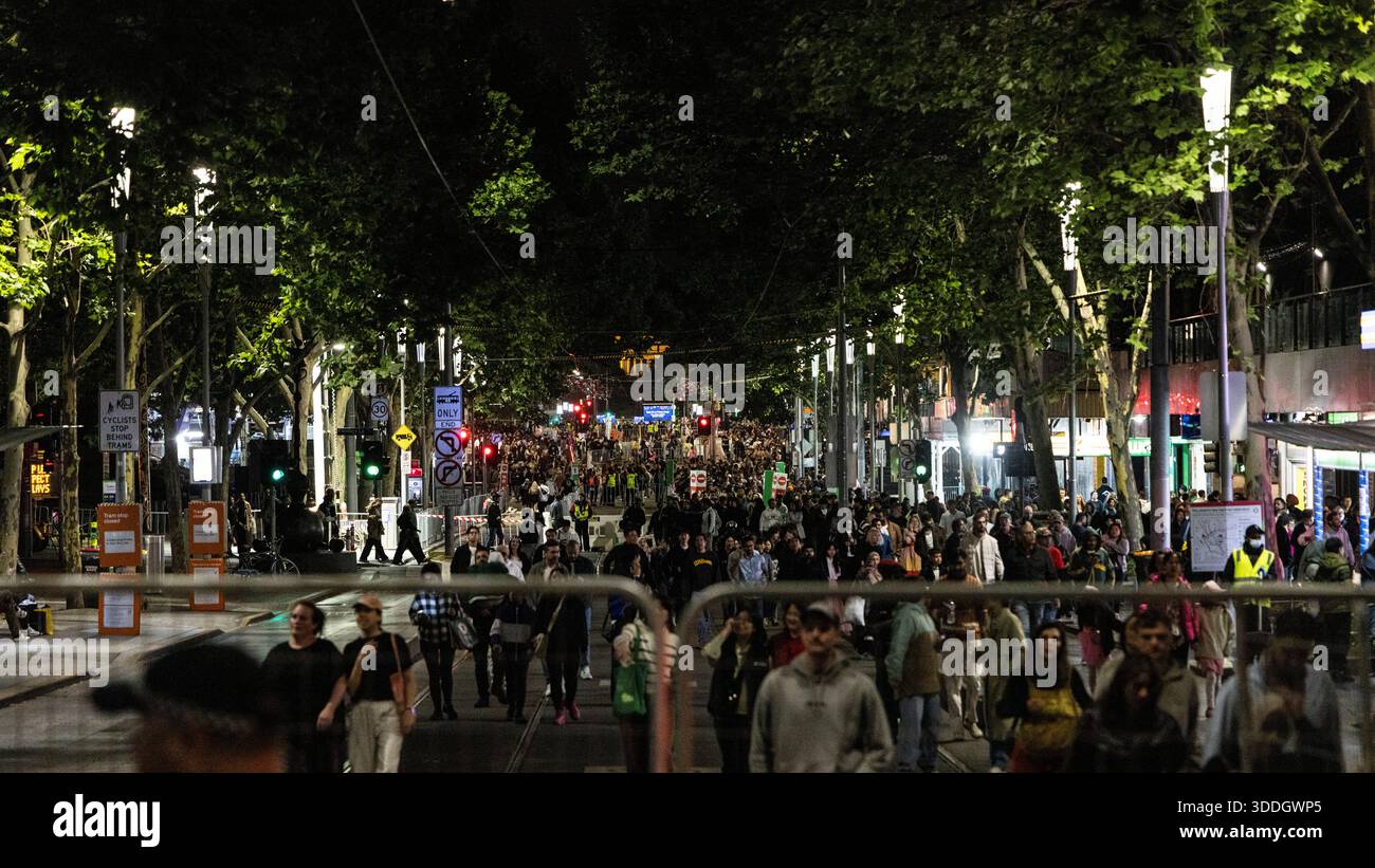 Crowds are seen making their way home from Flinders Street Station ...