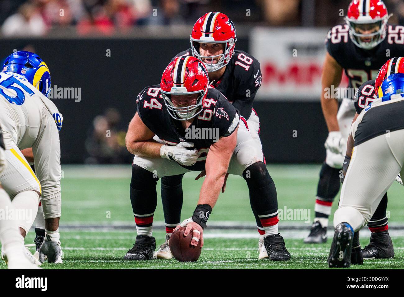 Atlanta Falcons center Ryan Neuzil (64) prepares to snap the ball to ...