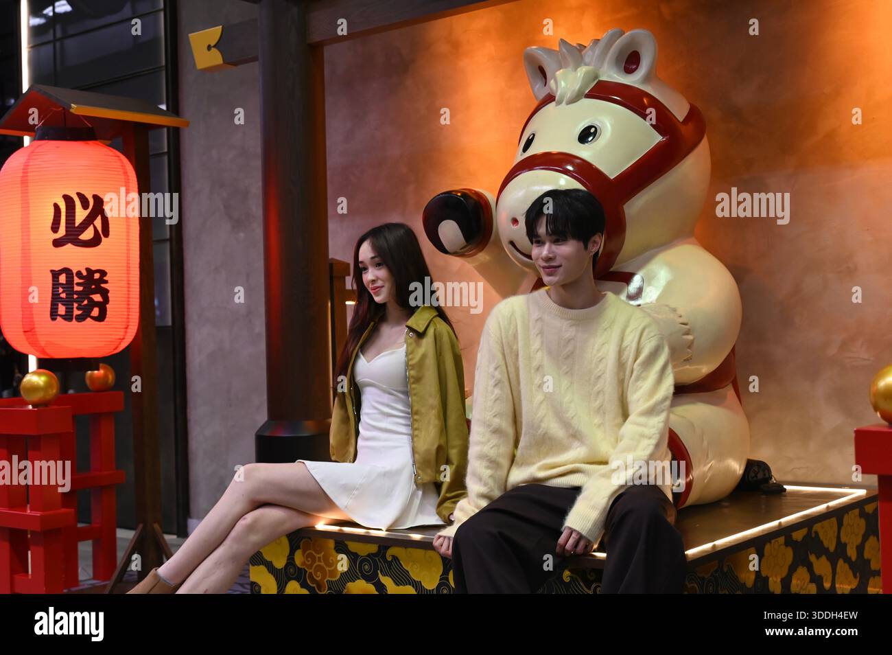 A general view showing two women posing photo with the racing ...