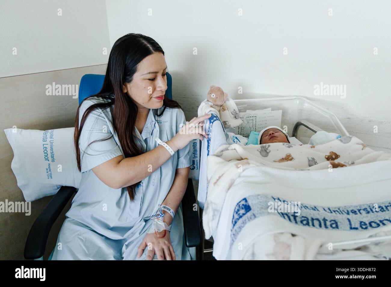 Zaira poses with her son Santiago, who was one of the first babies born ...