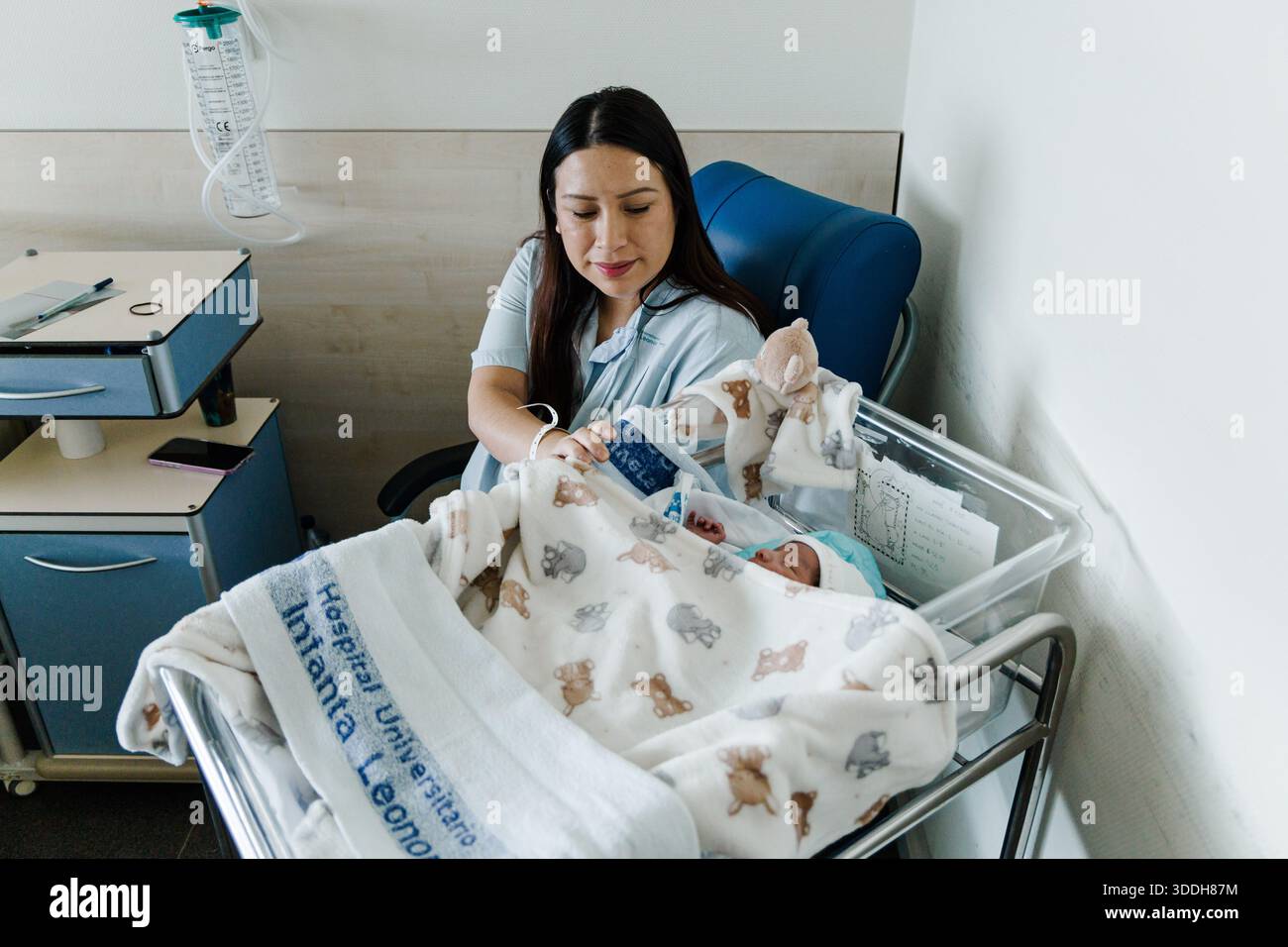 Zaira poses with her son Santiago, who was one of the first babies born ...