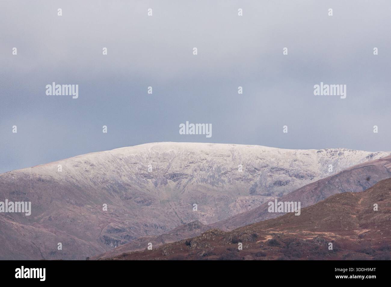 UK 1st January 2026 UK Weather Cumbria .Snow on high fells above Lake ...
