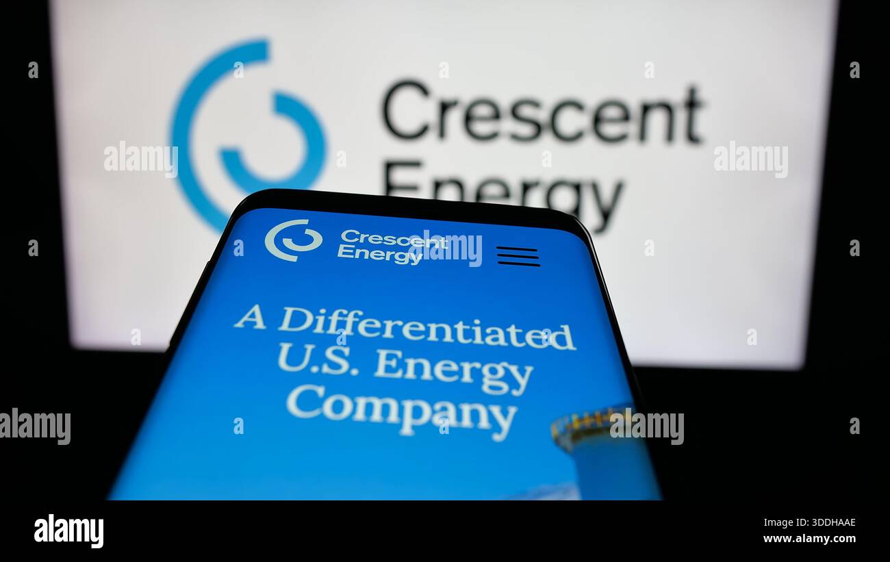 In this photo illustration, a mobile phone with the website of US oil ...