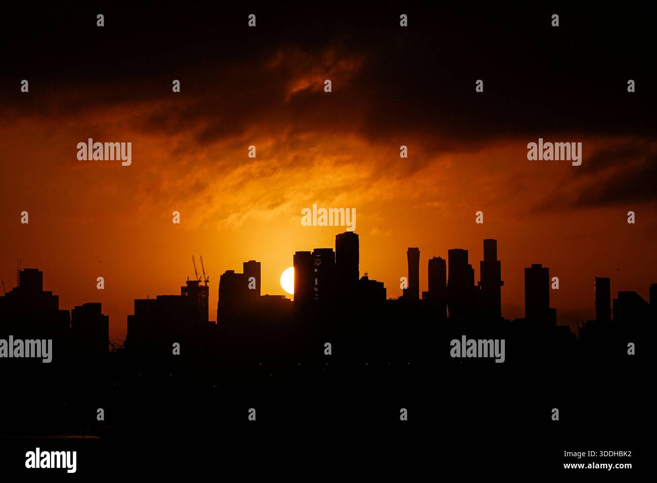 The sun rises over Melbourne’s city skyline. The first sunrise of 2026 ...