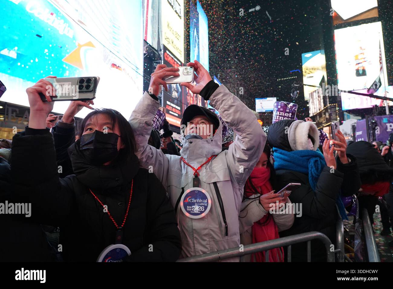 Reveler's gather in Time's Square for the 2026 New Year's Eve Ball Drop ...