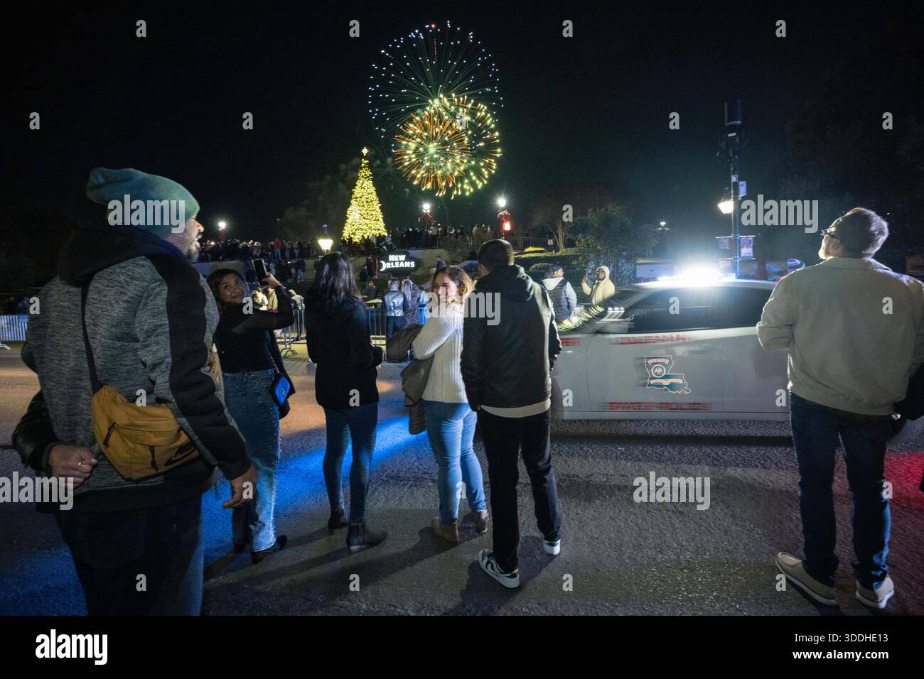 A Louisiana State Police vehicle blurs past it patrols at midnight as ...