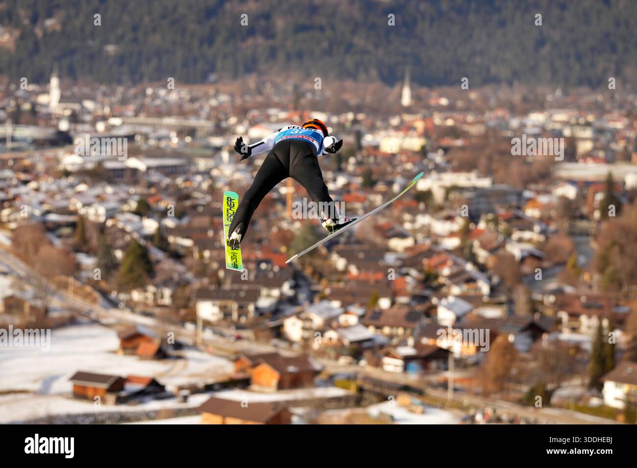 Jason Colby, of the United States, soars through the air during his ...