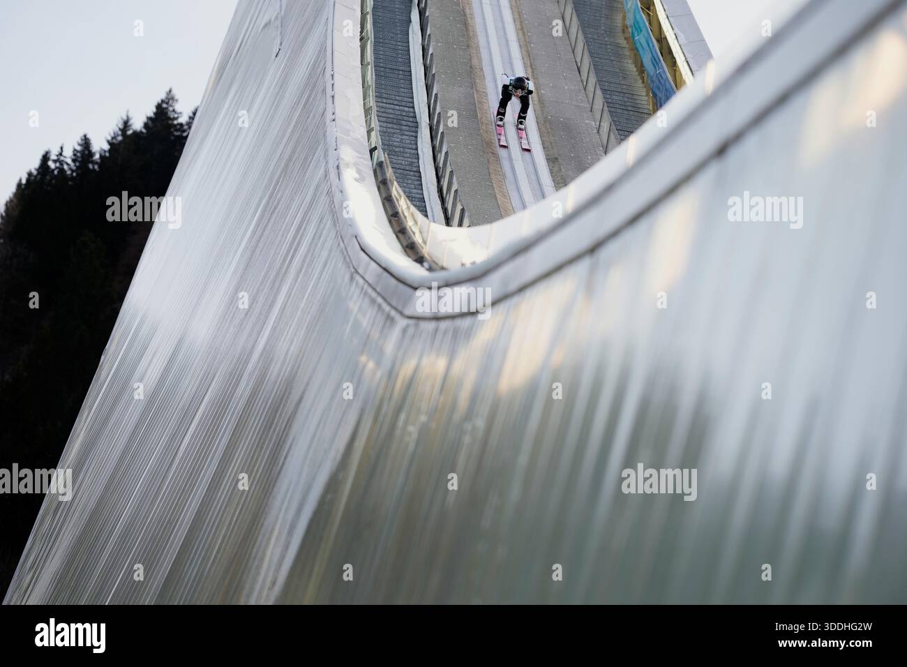Tate Frantz, of the United States, goes down the ramp during his trial ...