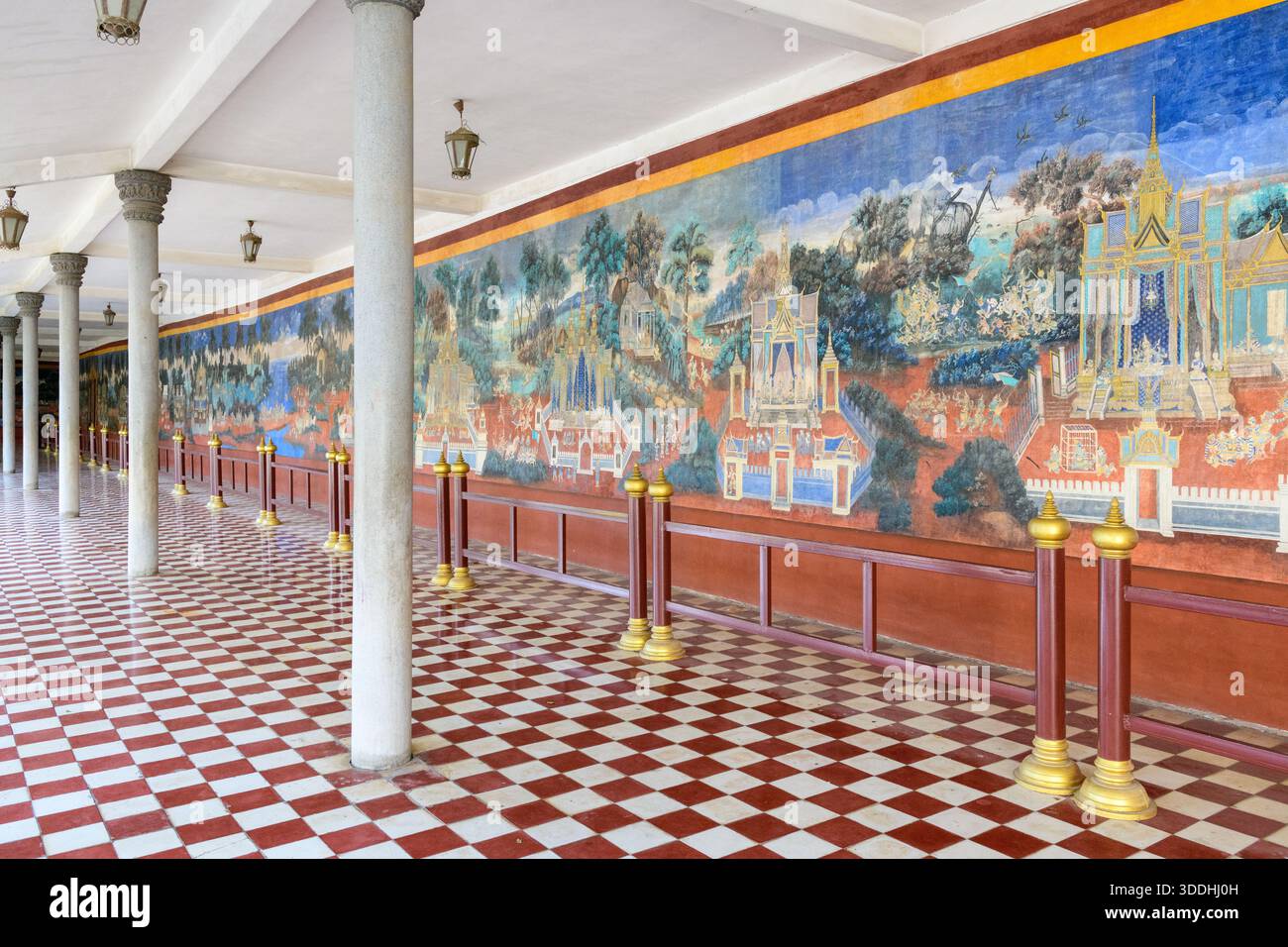 Long corridor with checkered tile floor and stone columns features a ...