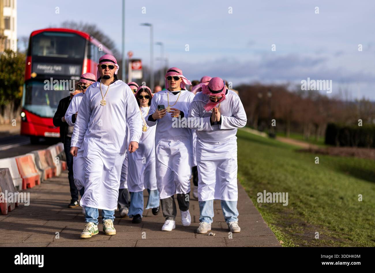 Darts fans arriving in fancy dress on day eighteen of the Paddy Power ...