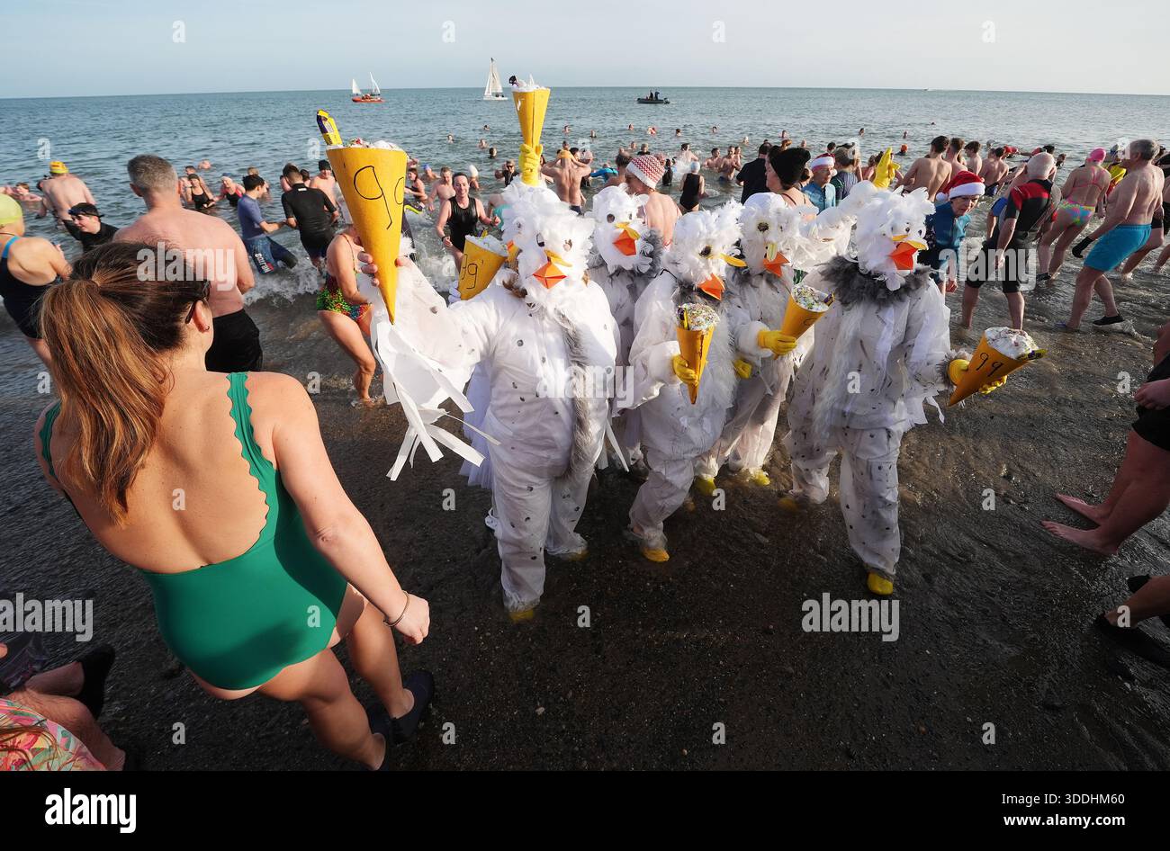 Members of the Bray Beach Bathers take part in the annual New Year’s ...