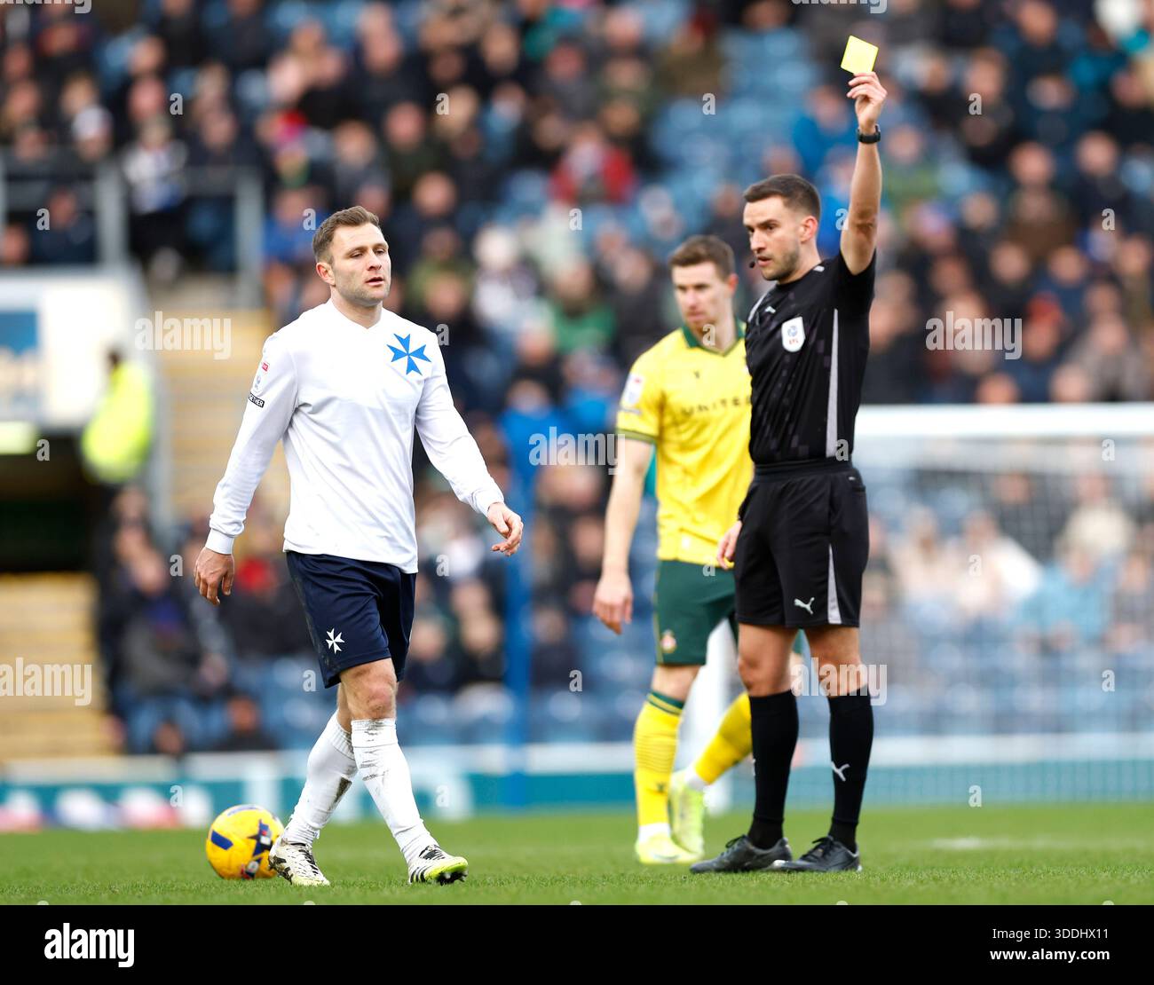 Blackburn Rovers' Sondre Tronstad is shown a yellow card by referee ...