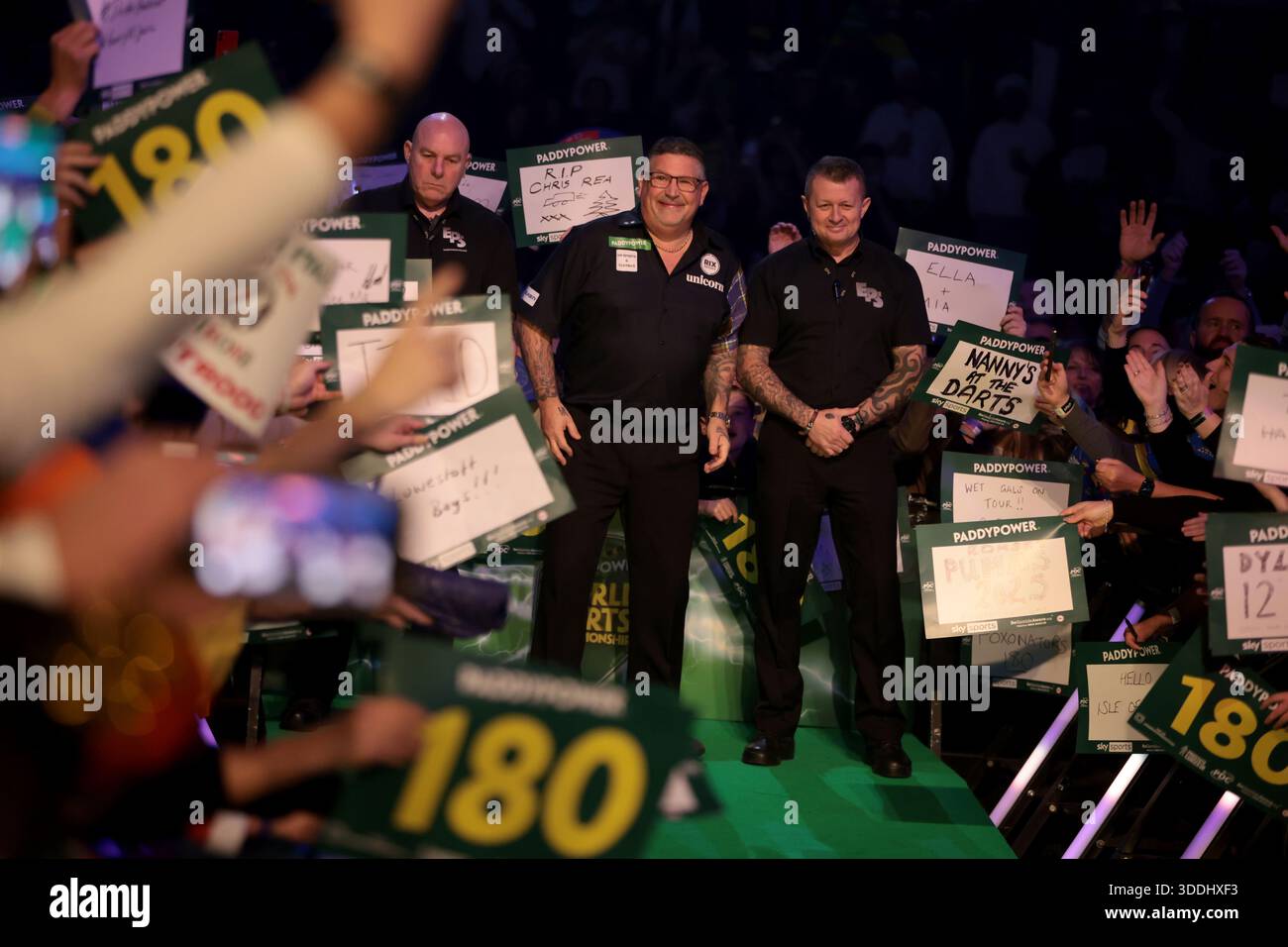 Gary Anderson makes his way to the stage before his match against ...