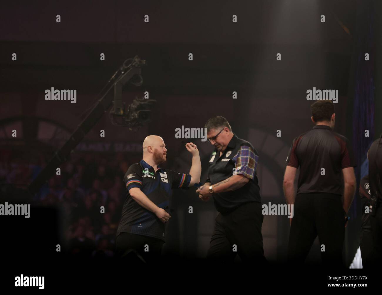 Justin Hood in action against Gary Anderson on day eighteen of the ...