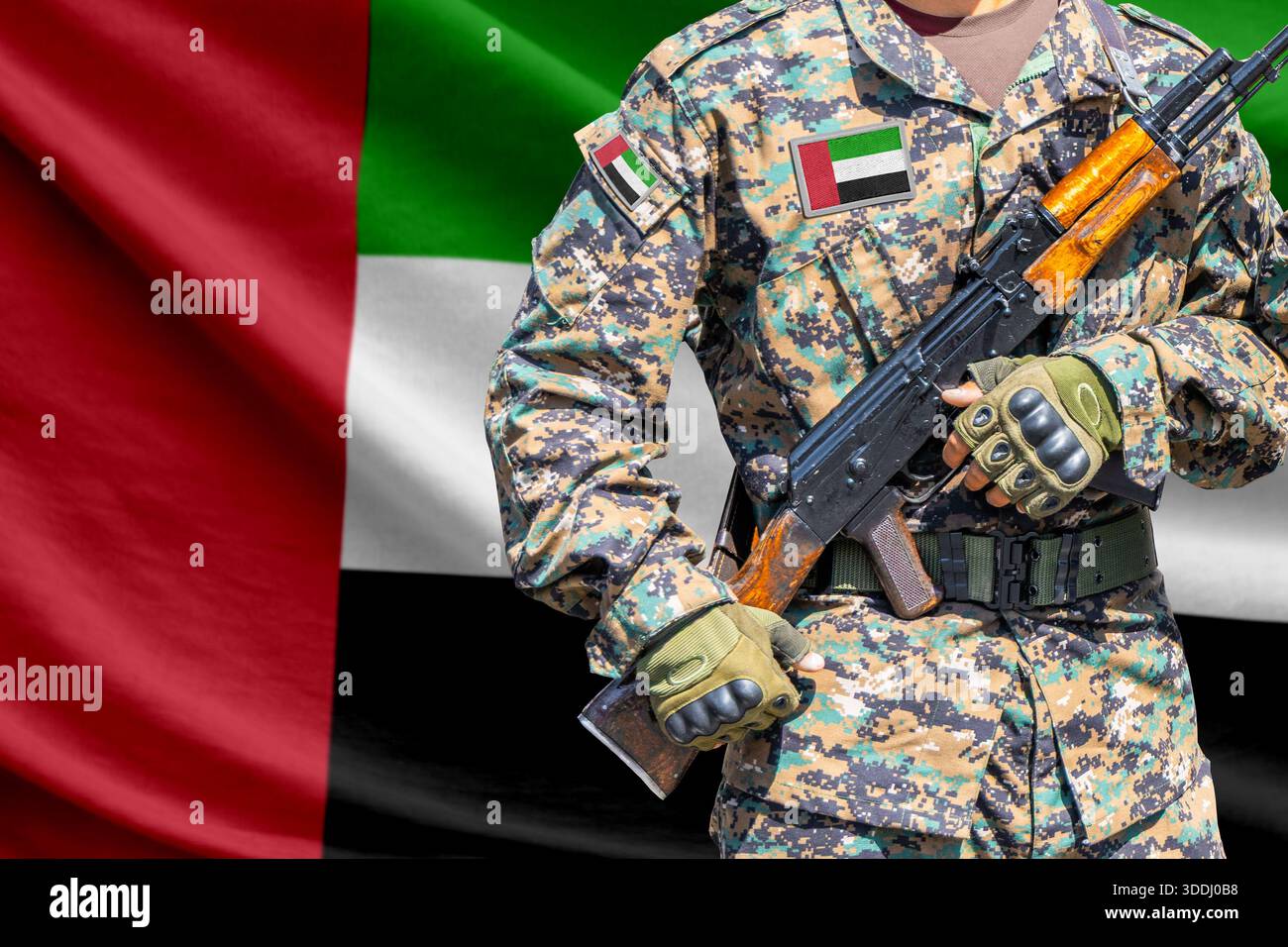 United Arab Emirates flag with soldier in military uniform holding ...