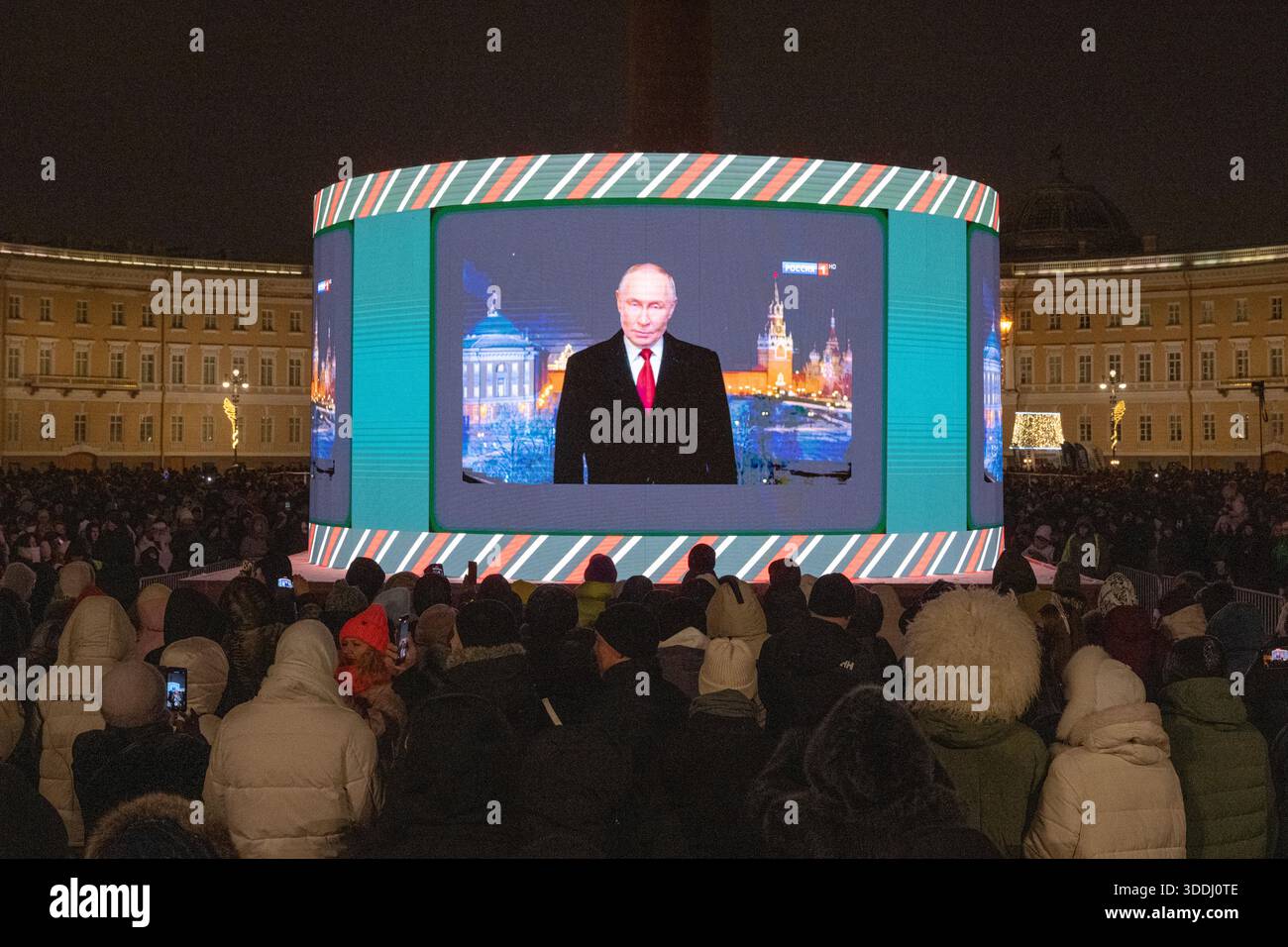 People watch a broadcast of Russian President Vladimir Putin before ...
