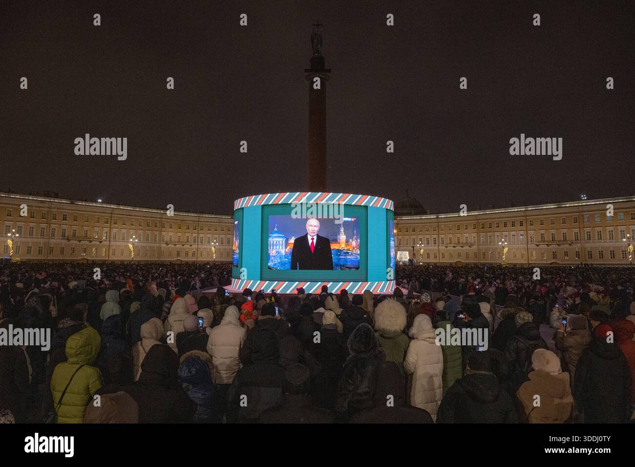 People watch a broadcast of Russian President Vladimir Putin before ...