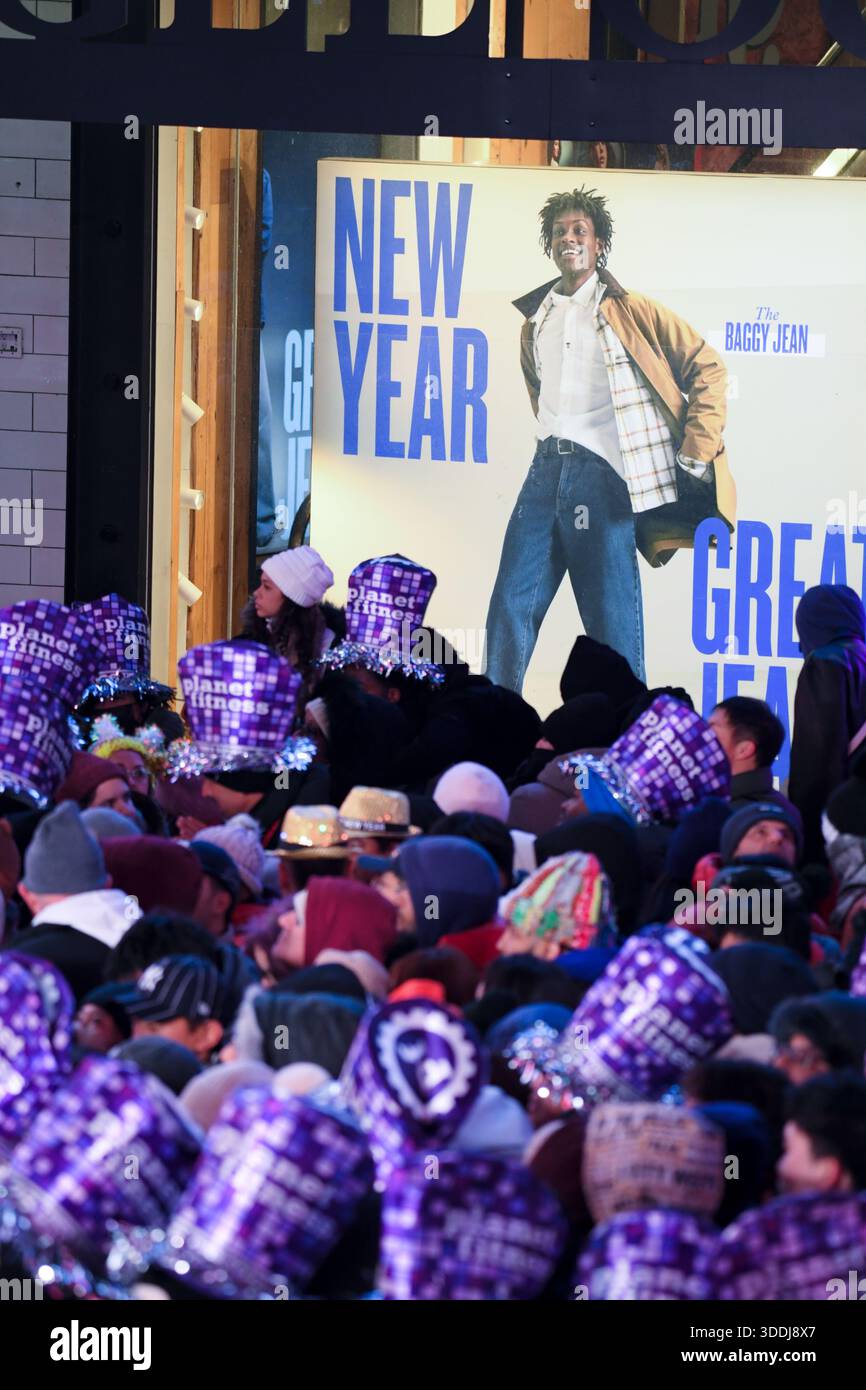 Revelers are seen during the Times Square New Year's Eve 2026 ...