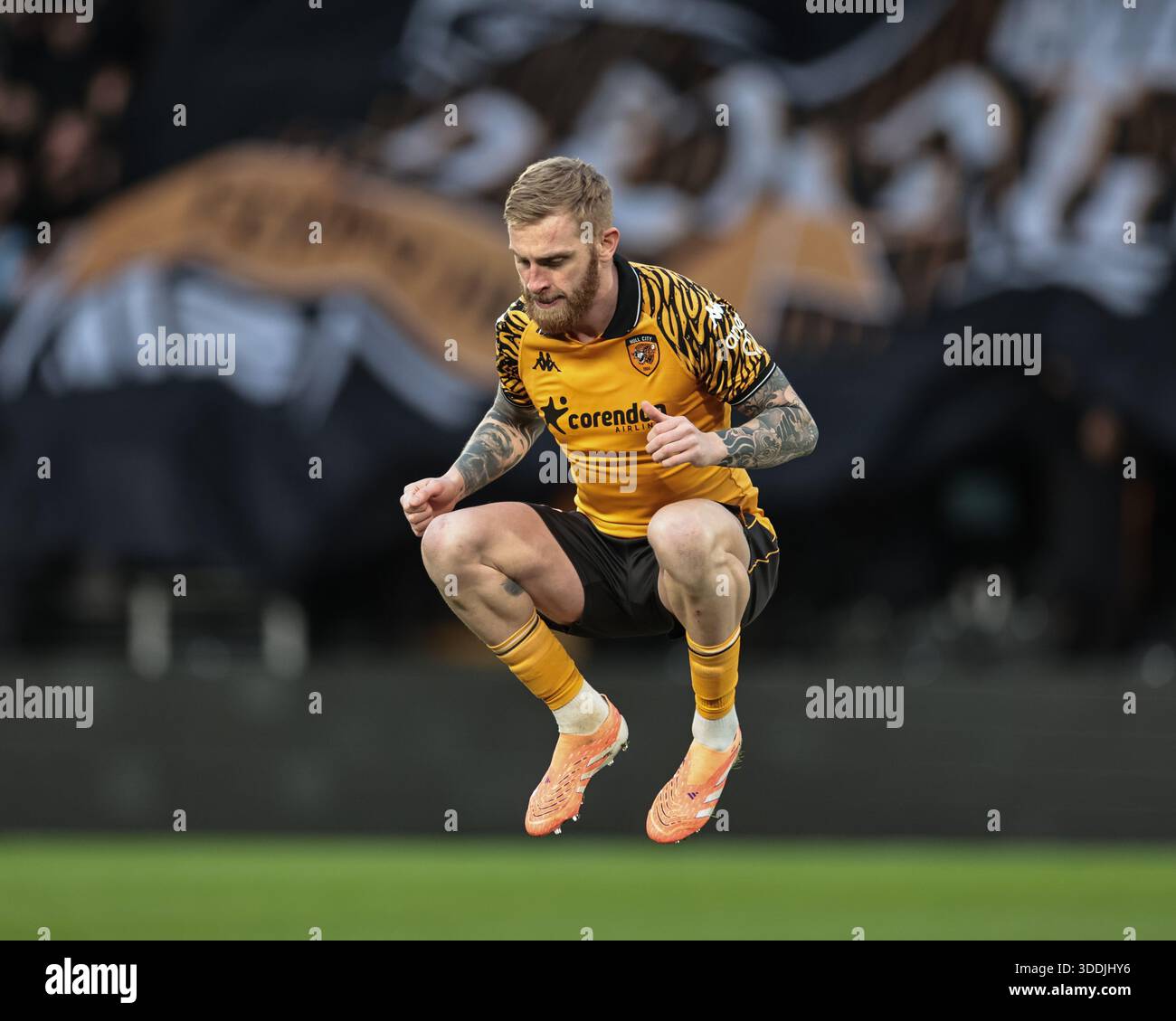 Oliver McBurnie of Hull City jumps and stretches his legs during the ...