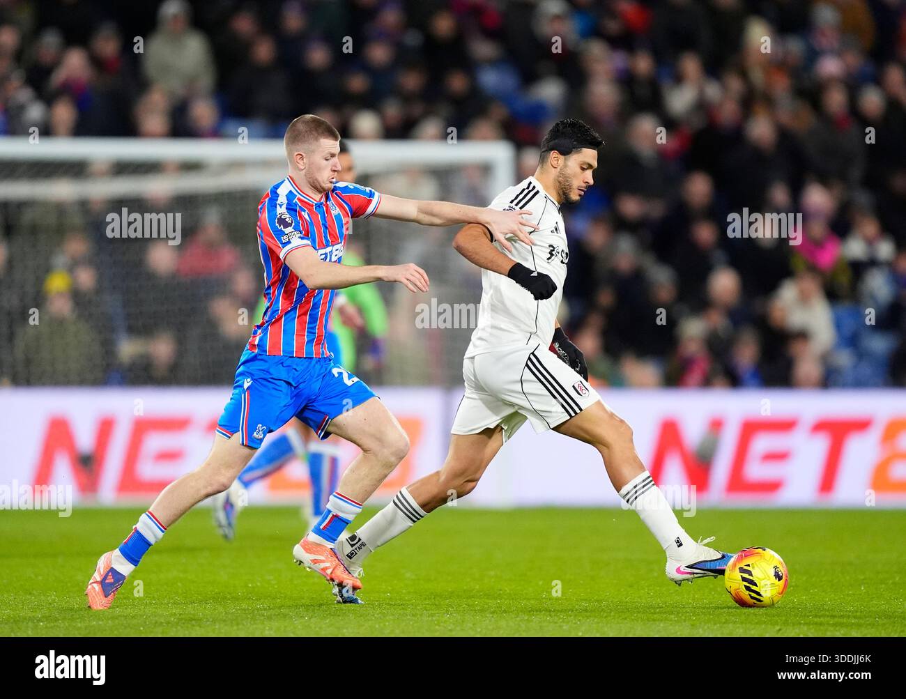 Crystal Palace's Adam Wharton (left) and Fulham's Raul Jimenez battle ...