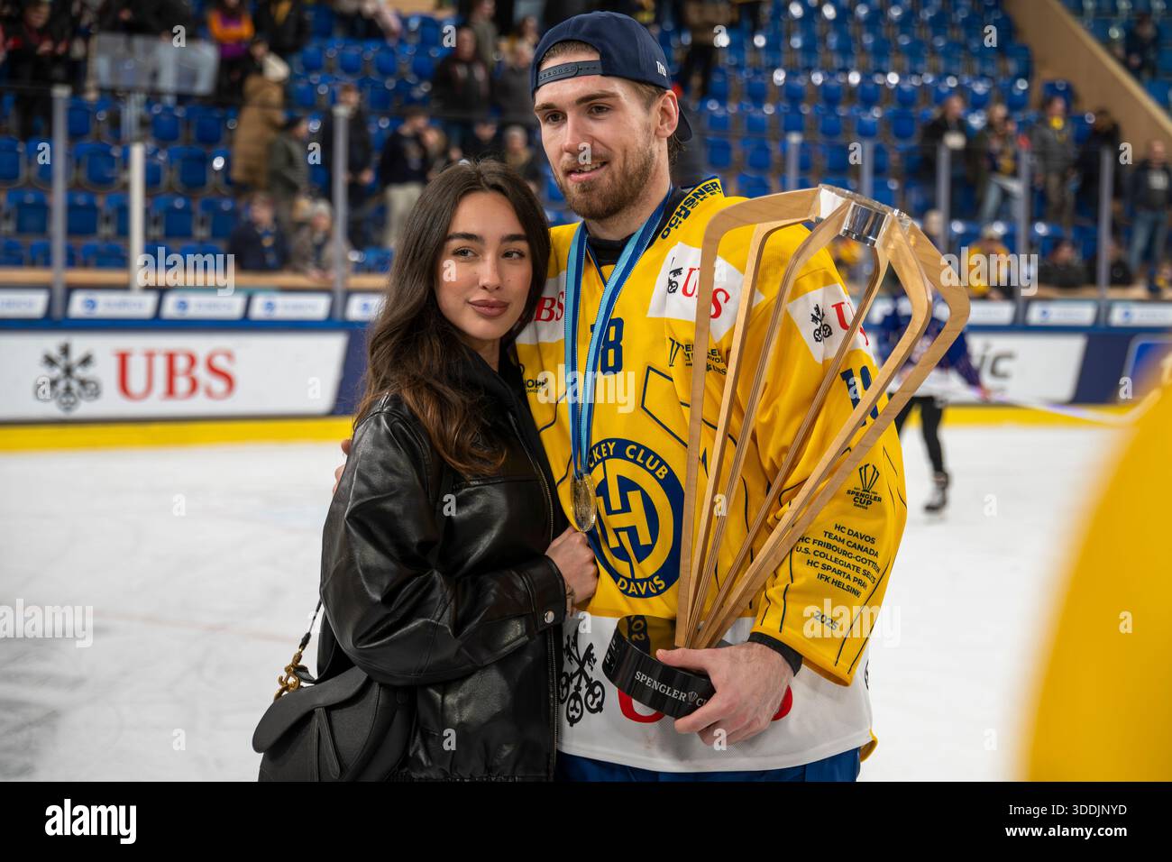 DAVOS, SWITZERLAND - DECEMBER 31: Filip Zadina of Davos R) celebrates ...