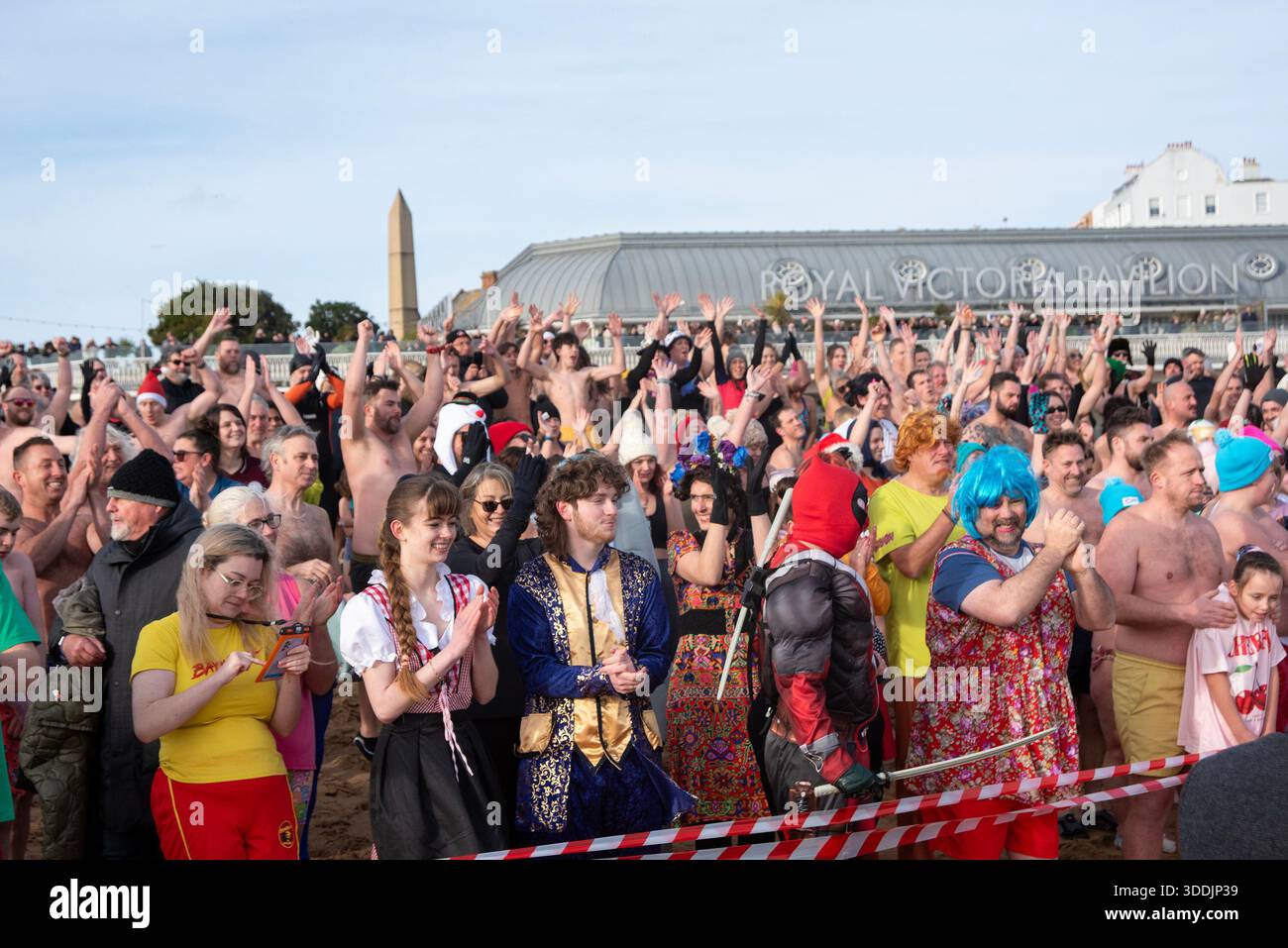The crowd of the New Year's Day Dip wave to the drone on the Ramsgate ...