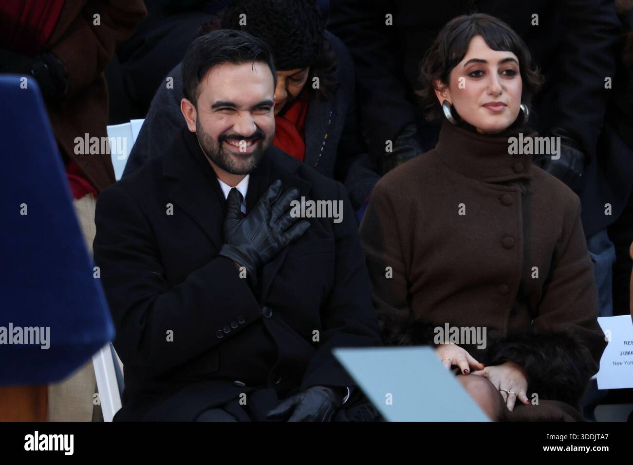 Mayor Zohran Mamdani reacts after arriving for his swearing-in ceremony ...
