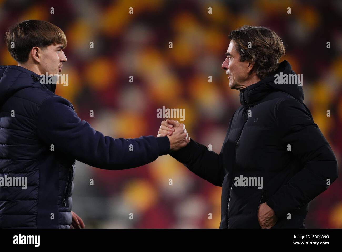 Tottenham Hotspur manager Thomas Frank (right) ahead of the Premier ...