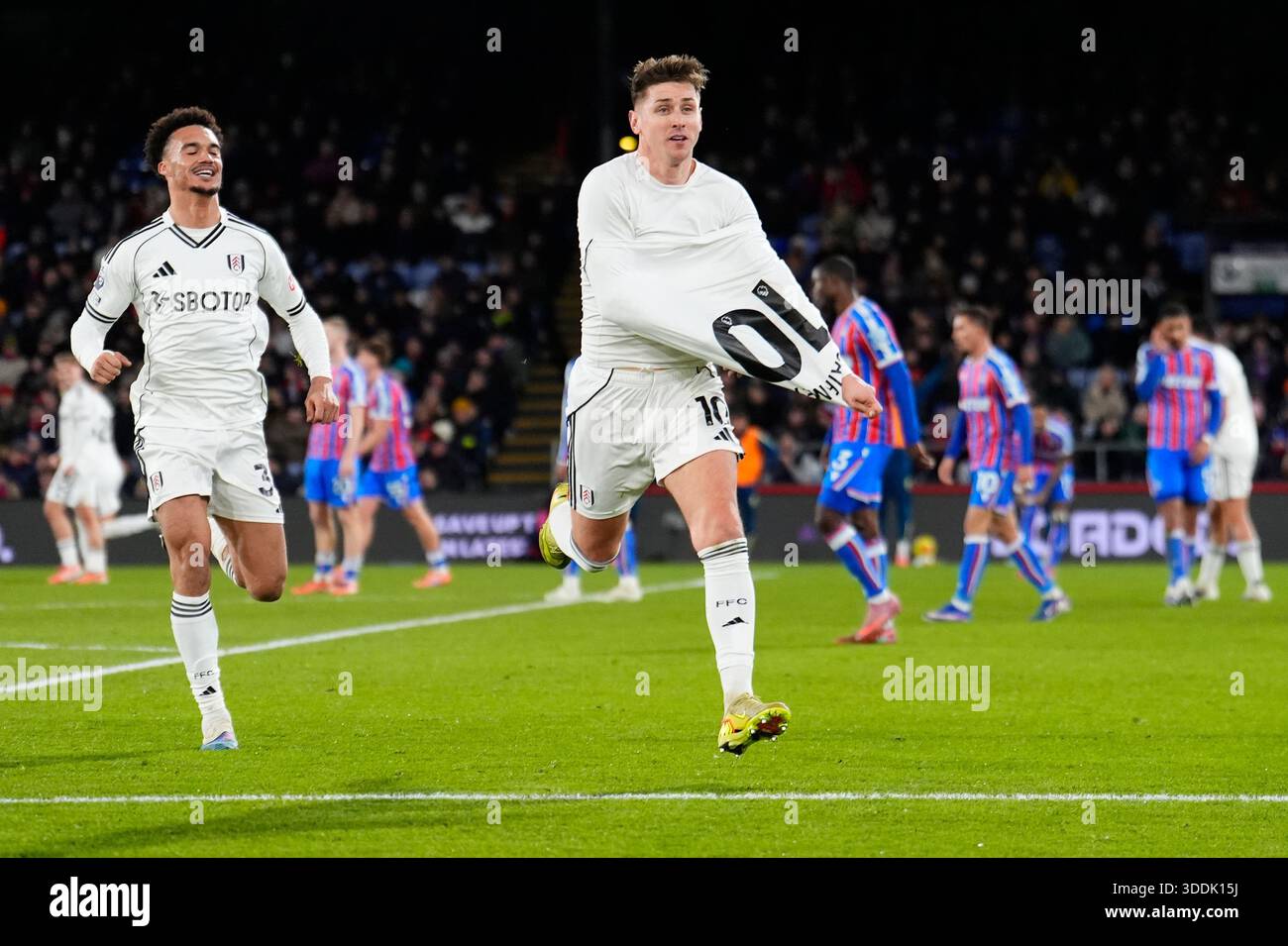 Fulham's Tom Cairney (right) celebrates with Antonee Robinson after ...
