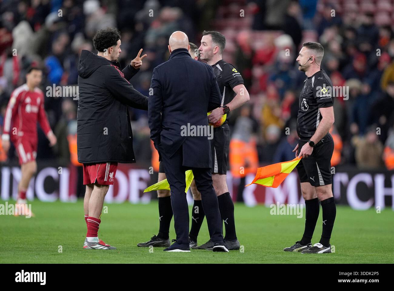 Liverpool manager Arne Slot speaks to the referee at the final whistle ...
