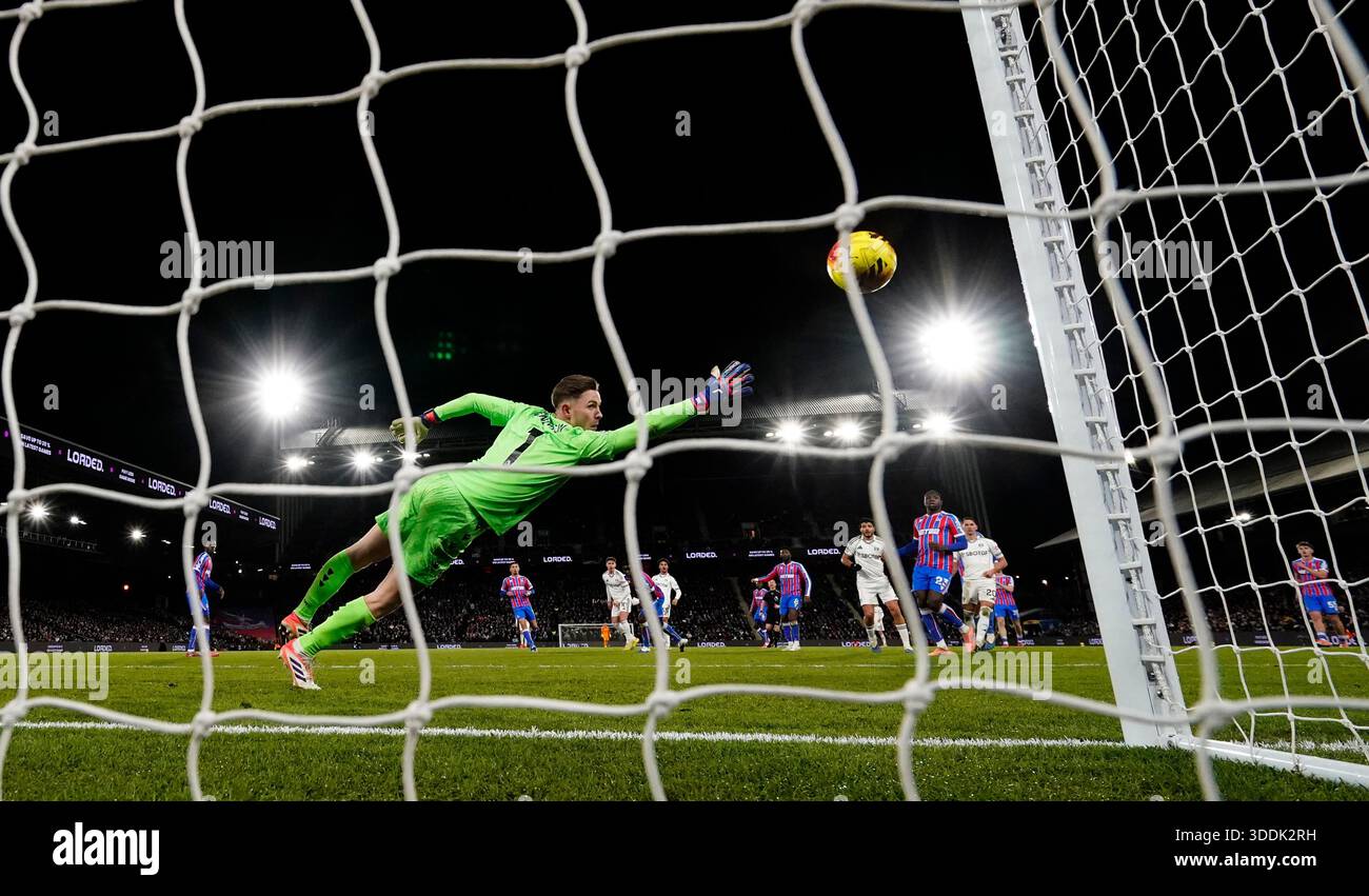 Fulham's Tom Cairney (rear, fourth left) shoots past Crystal Palace ...