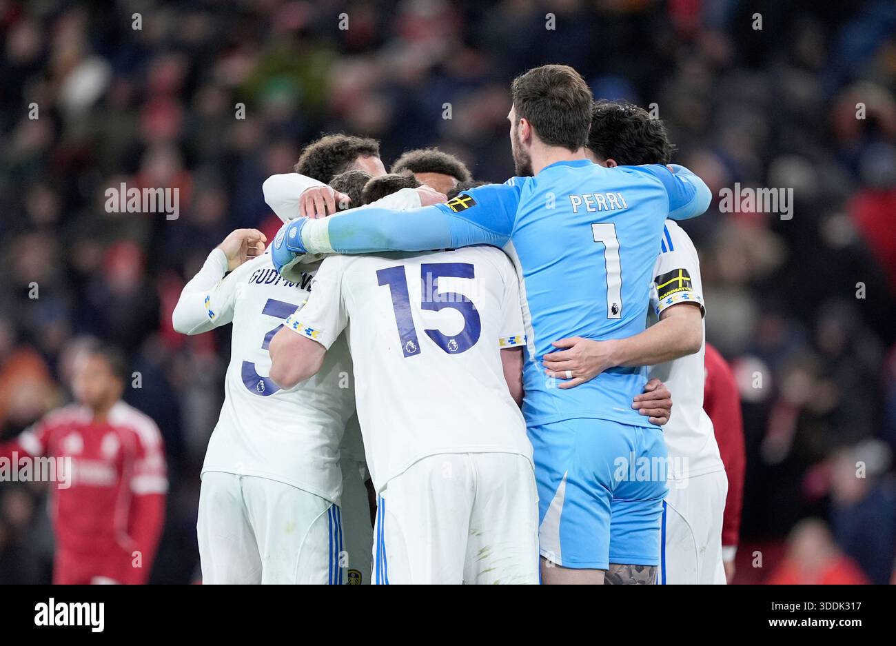 Leeds United players huddle at the final whistle after the Premier ...