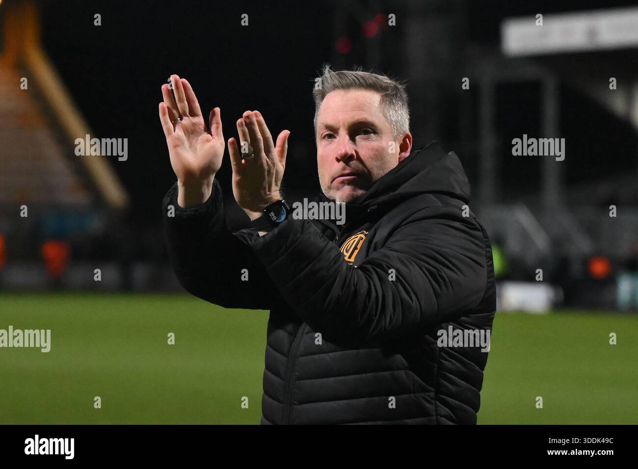 Neil Harris manager of Cambridge United applauds fans during the Sky ...