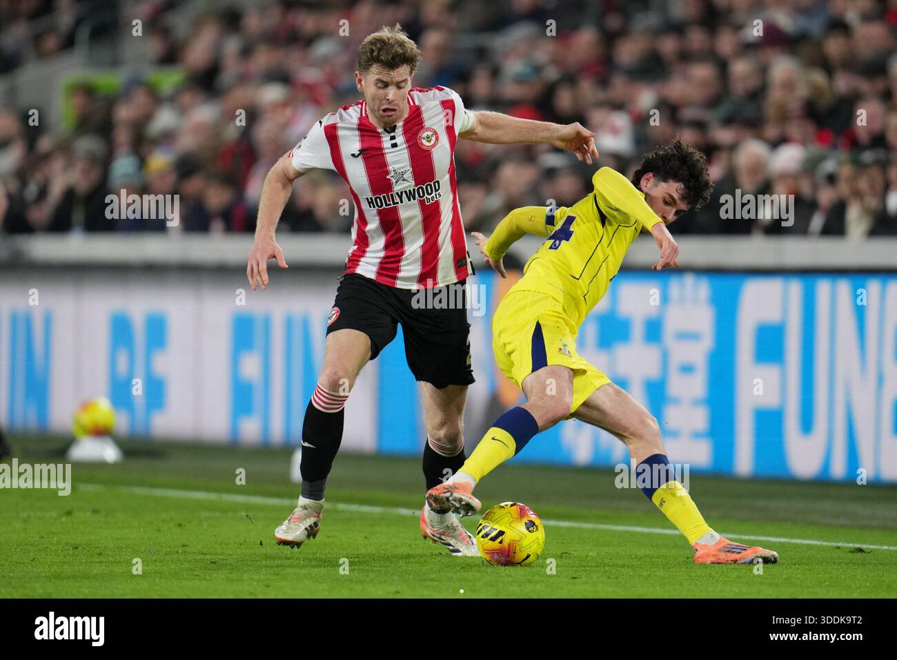 Nathan Collins of Brentford wins ball off Archie Gray of Tottenham ...