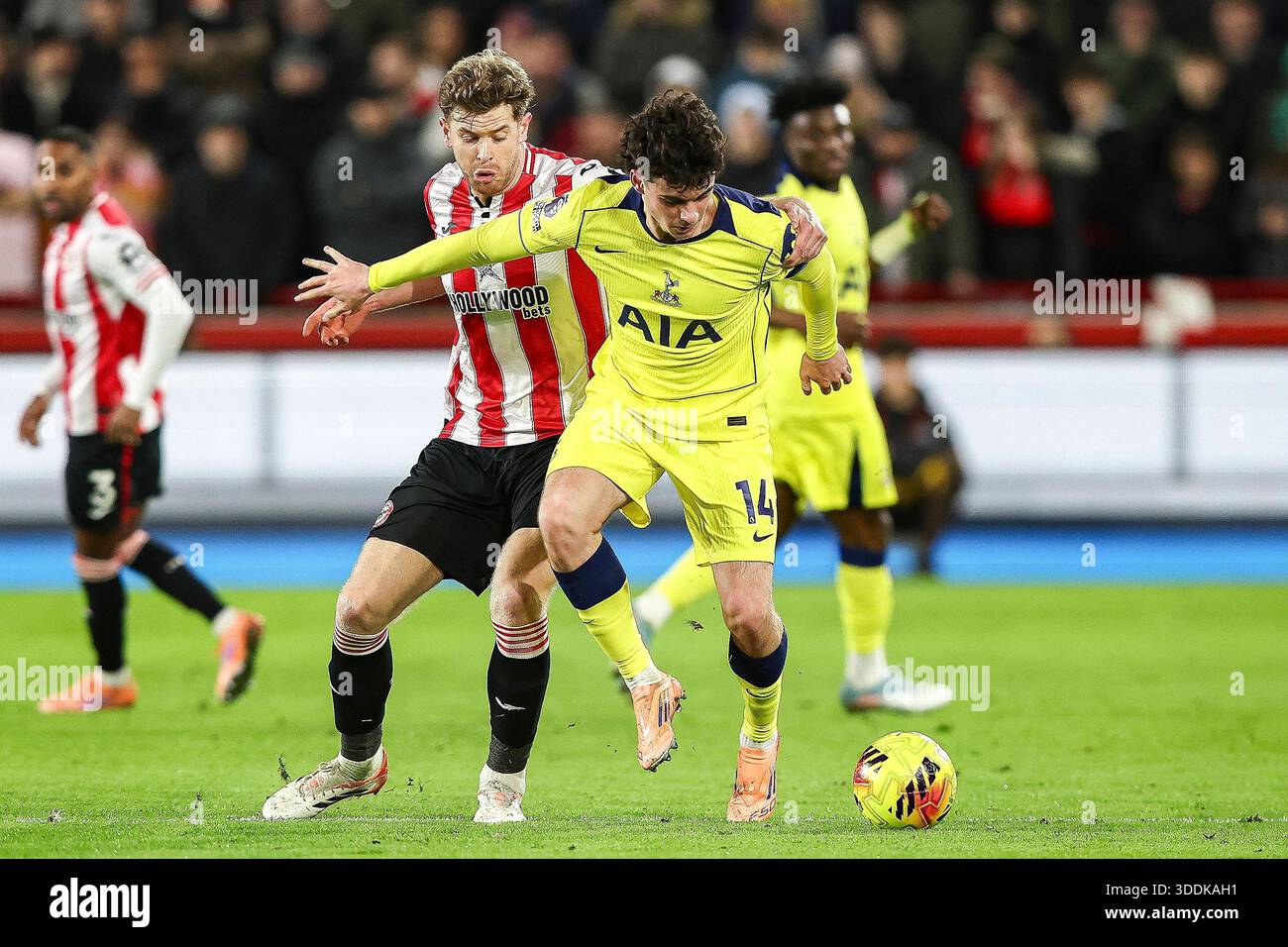 Nathan Collins of Brentford battles for possession with Archie Gray of ...
