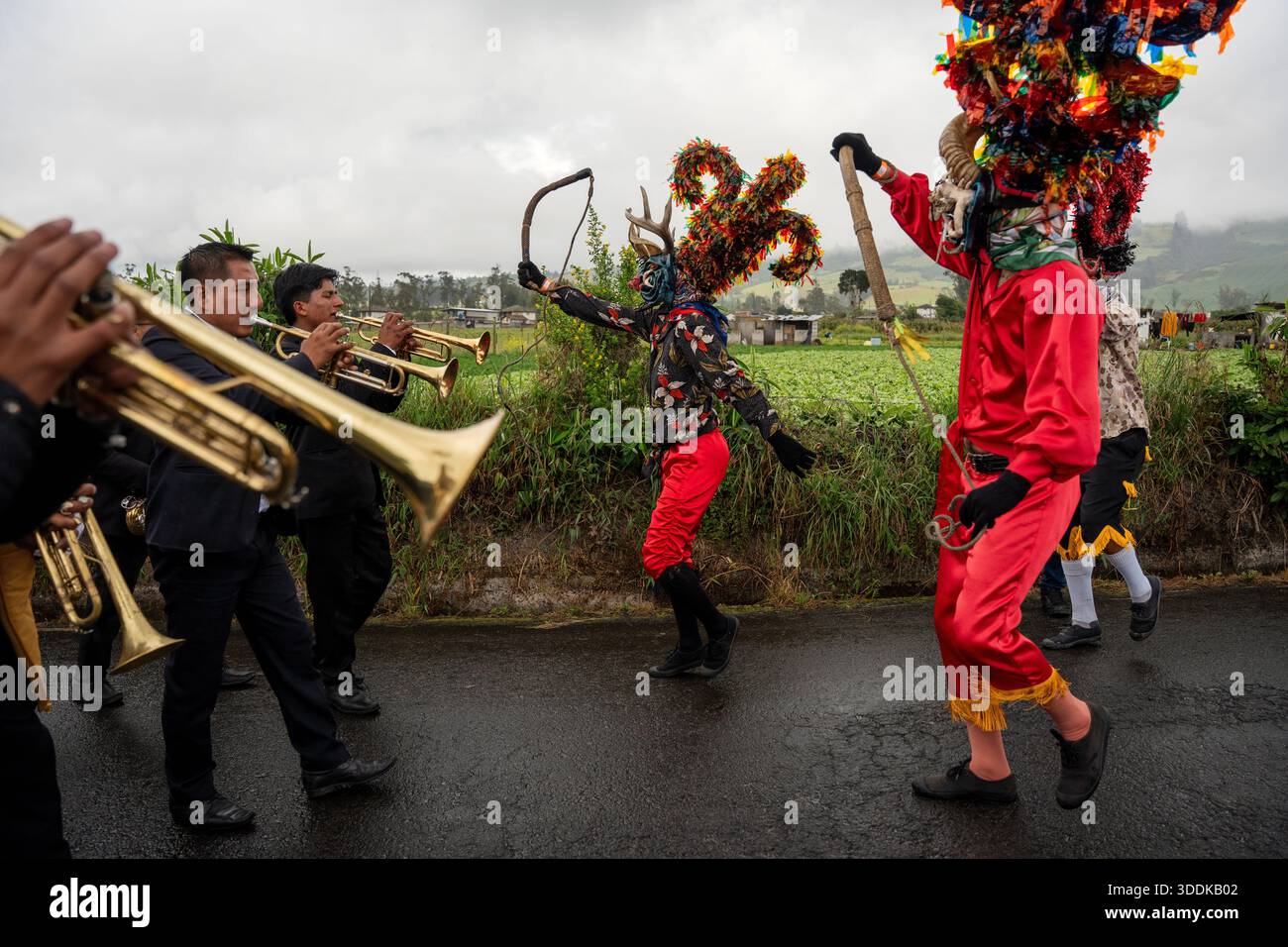 Revelers wearing devil masks dance during traditional New Year's ...