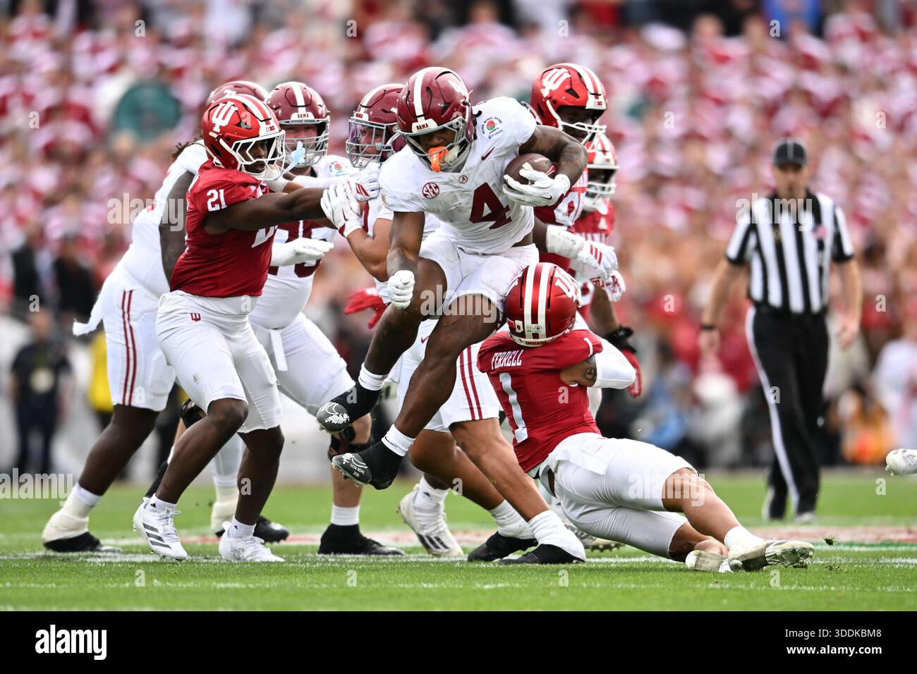 Alabama running back Daniel Hill (4) leaps over Indiana defensive back ...