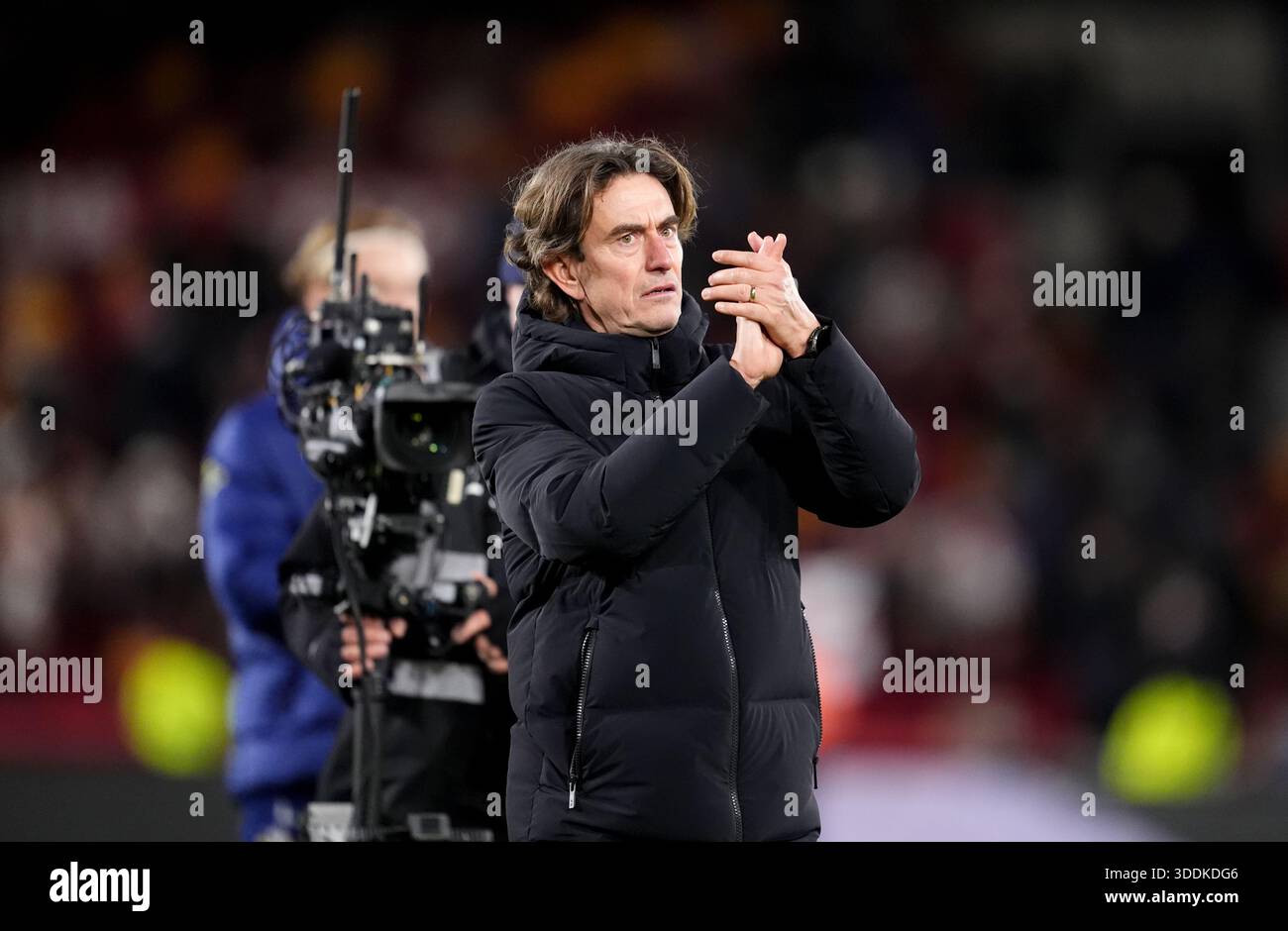 Tottenham Hotspur manager Thomas Frank applauds the fans after the ...