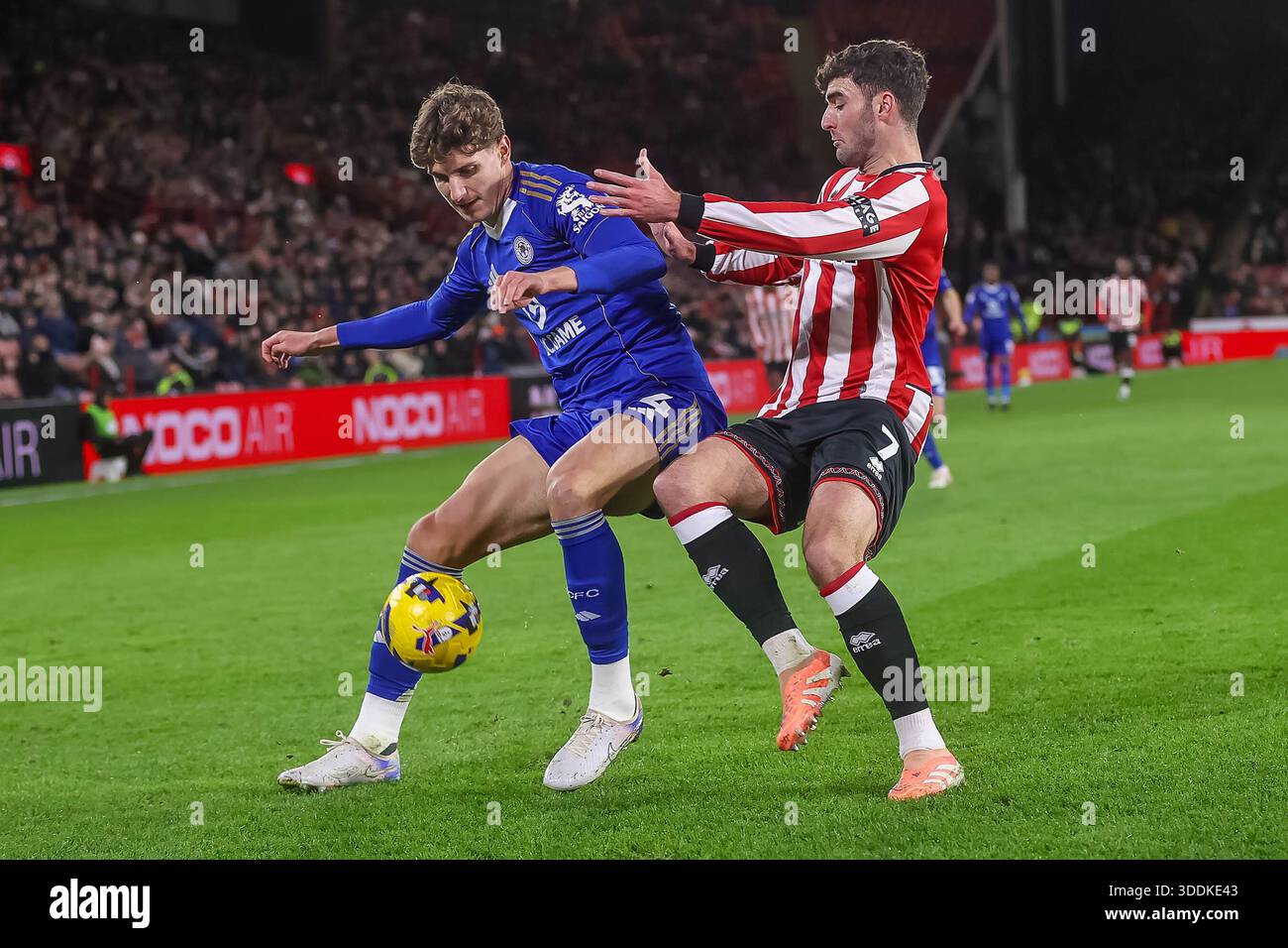 Ben Nelson shields the ball from Tom Cannon during the Sky Bet ...