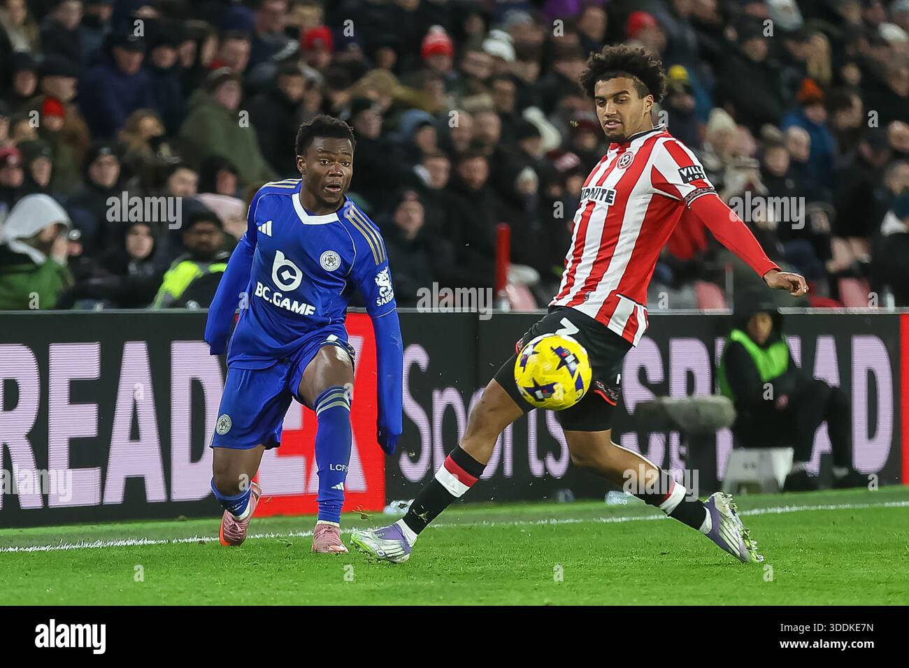 Abdul Fatawu flicks the ball past Sam McCallum during the Sky Bet ...