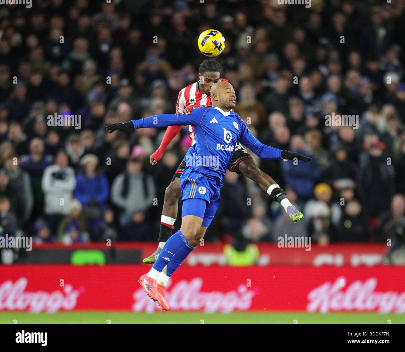 Femi Seriki of Sheffield United and Jordan Ayew of Leicester City duals ...