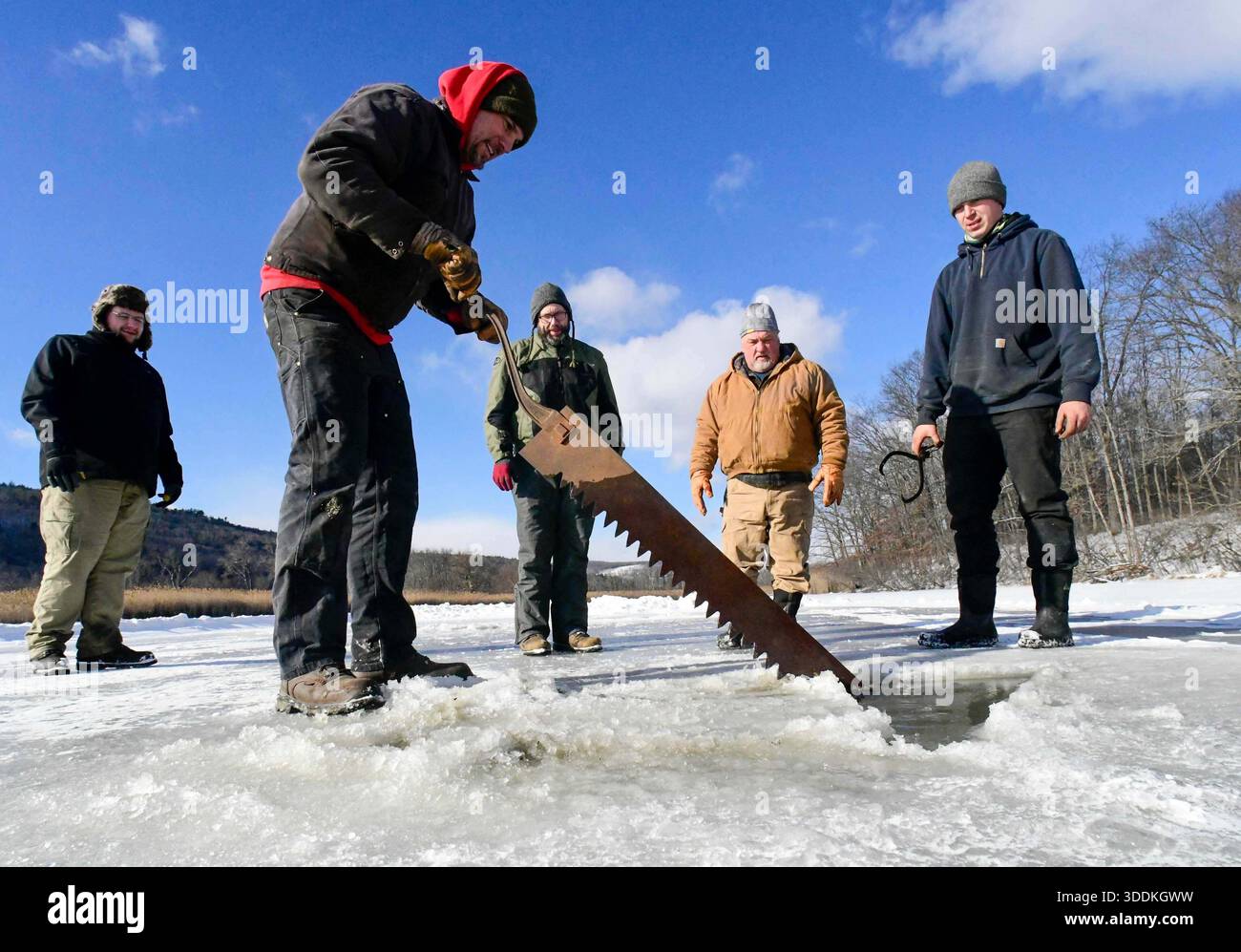 Members of the Hinsdale, N.H., Historical Society demonstrate how to ...