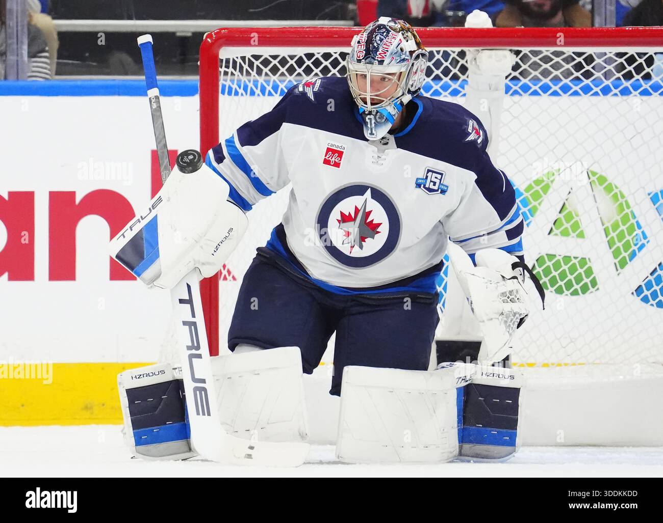 Winnipeg Jets goaltender Eric Comrie makes a save against the Toronto ...