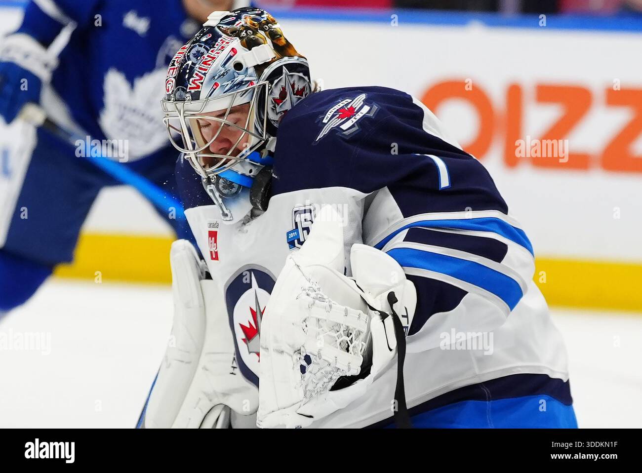 Winnipeg Jets goaltender Eric Comrie makes a save against the Toronto ...