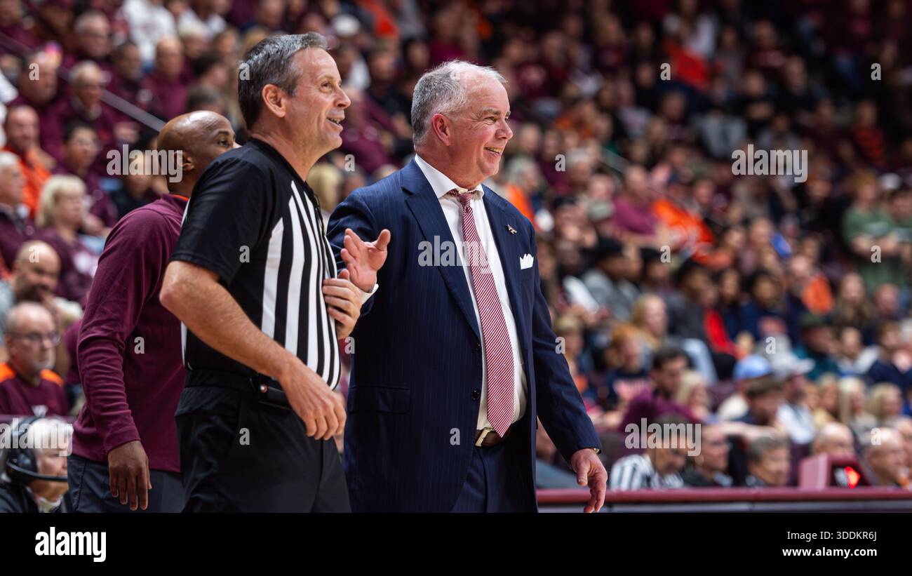 Virginia Tech head coach Mike Young laughs with ref during an NCAA ...