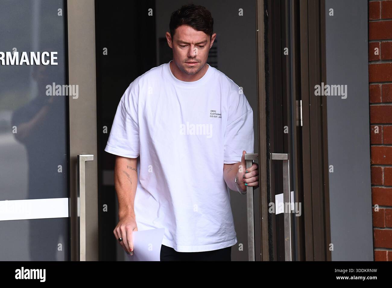 Lachie Neale arrives to a press conference announcing his decision to ...