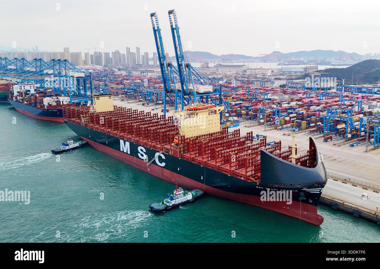 QINGDAO, CHINA - JANUARY 1, 2025 - A container ship is slowly berthing ...