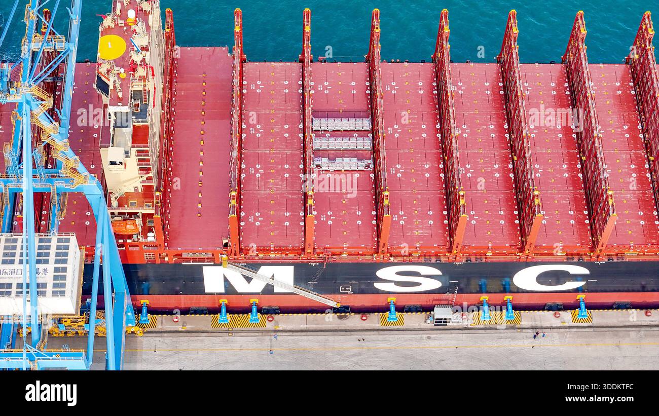 QINGDAO, CHINA - JANUARY 1, 2025 - A cargo ship docks at the Qingdao ...