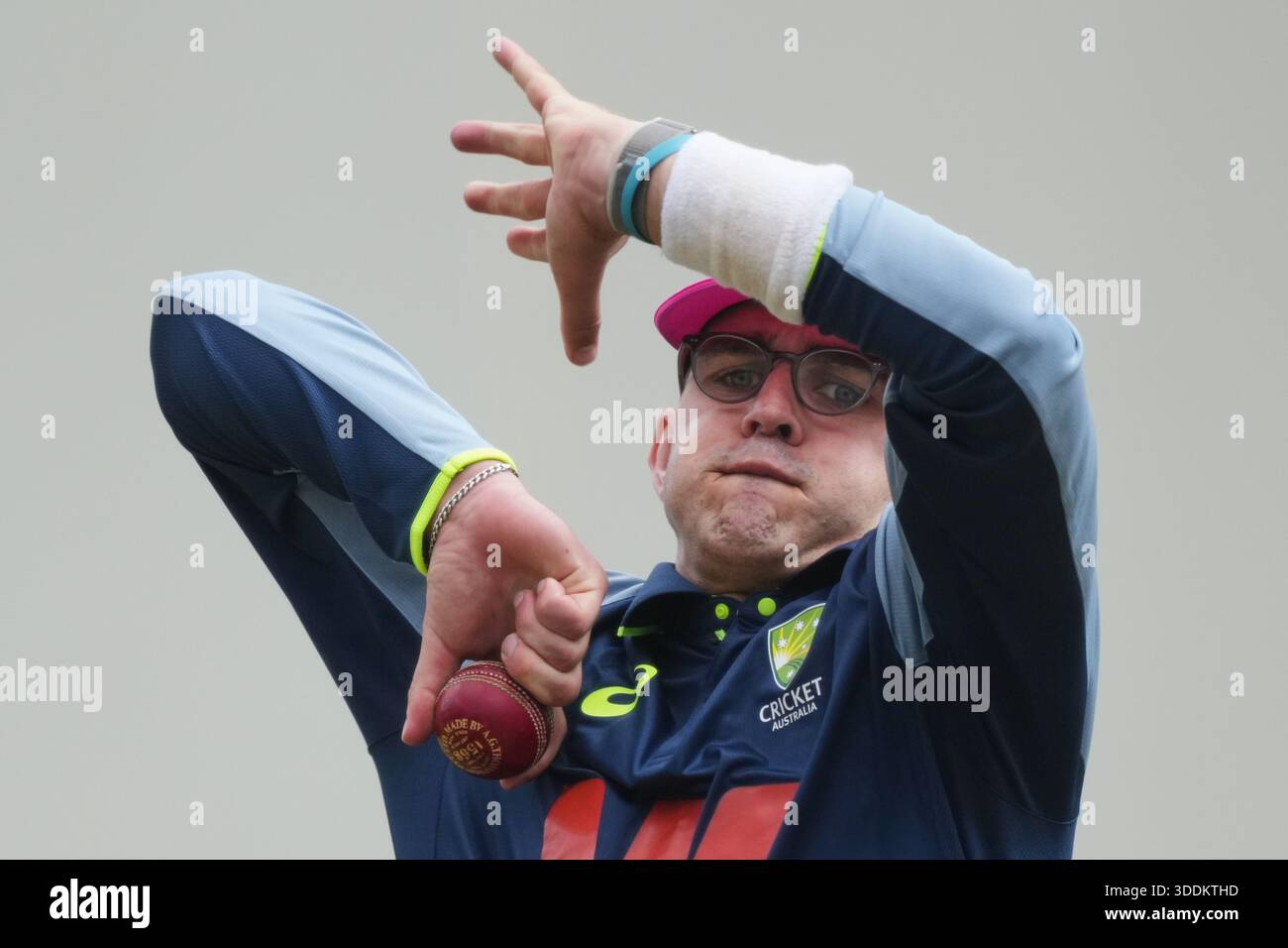 Australia's Todd Murphy bowls during a practice session ahead of the ...