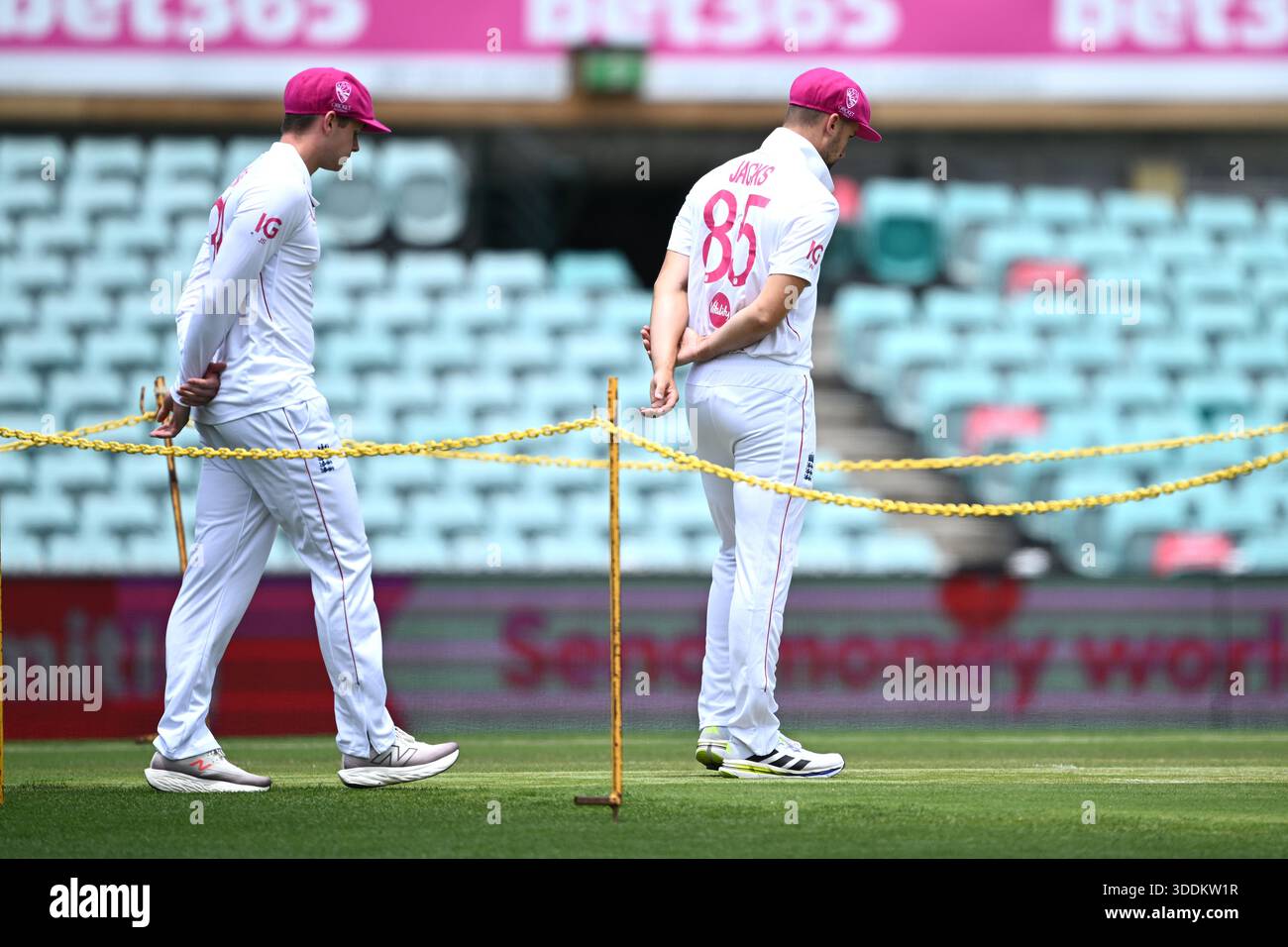 Joe Root and Jamie Smith (left) inspect the SCG pitch ahead of an ...